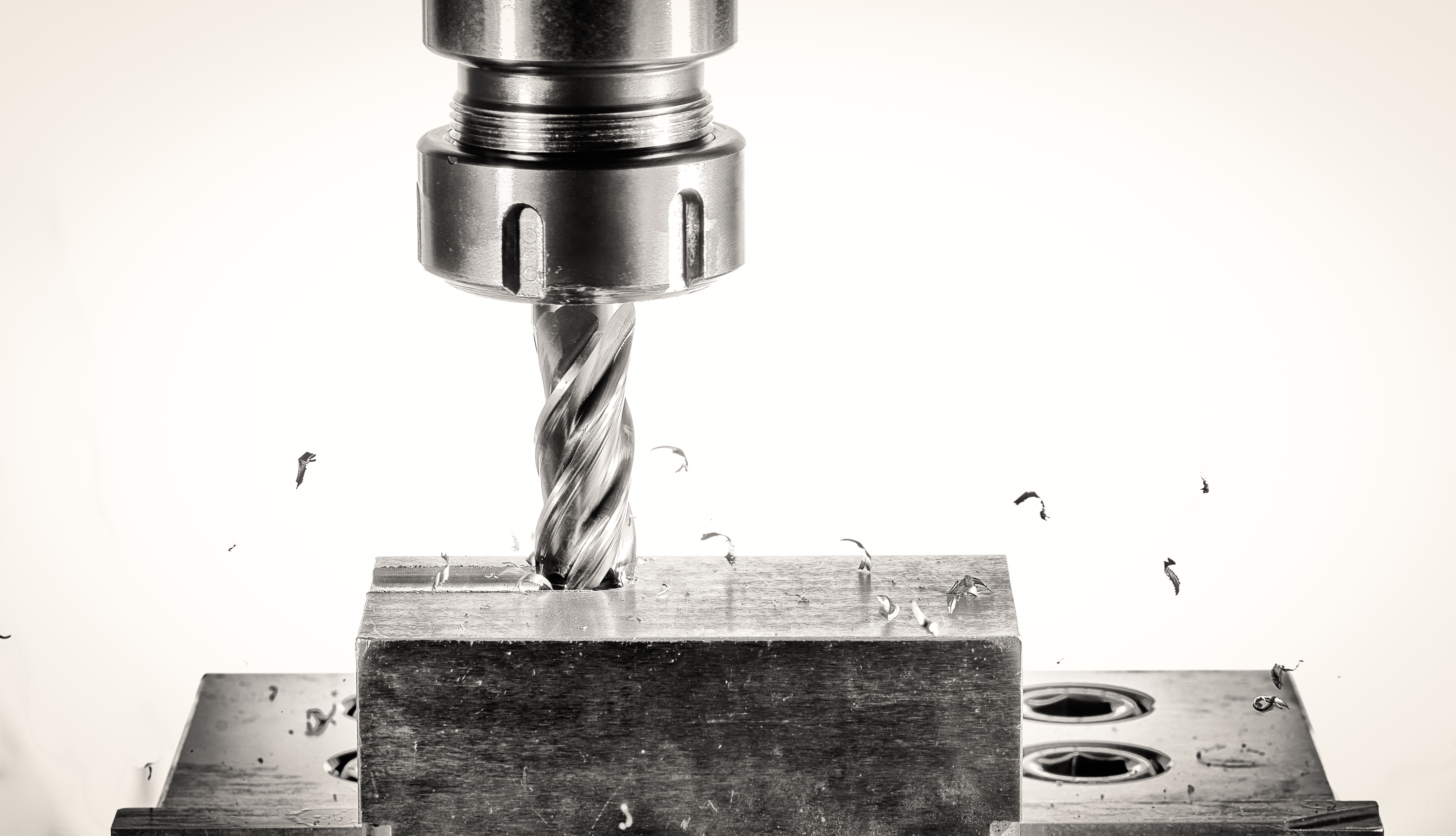cnc-milling-machine-spindle-with-cutter-flying-metal-splinter